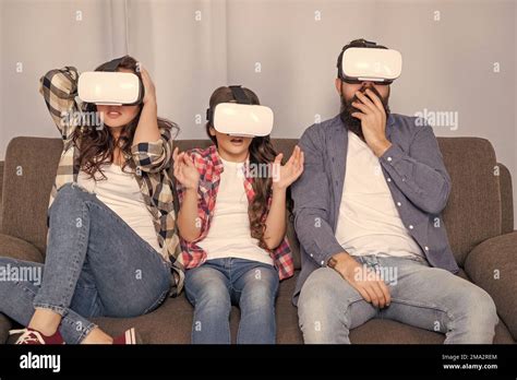 Happy Parents With Kid Use Modern Technology Mom Dad And Daughter Stock Photo Alamy