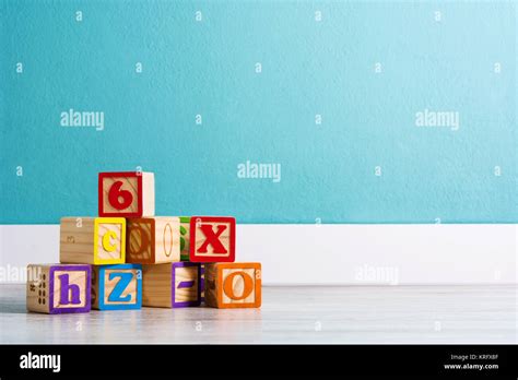 Wooden Cubes With Letters And Numbers In A Baby S Room Stock Photo Alamy