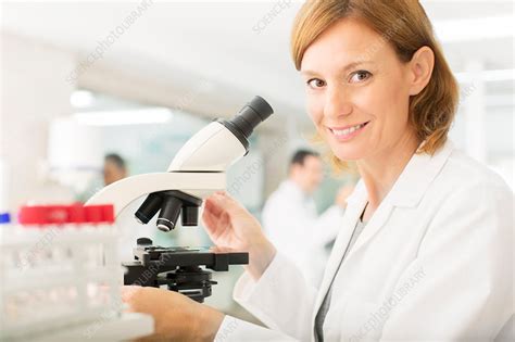 scientist using microscope in laboratory stock image f014 6018