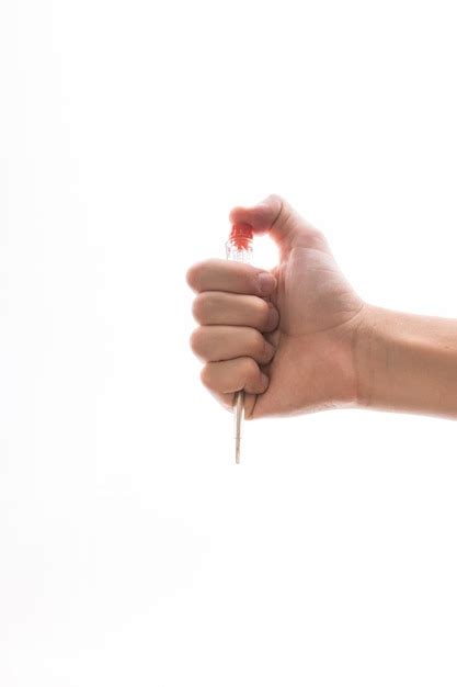 Premium Photo Hand Holding Circuit Tester Screwdriver On A White Background