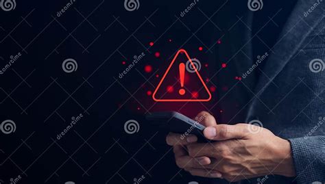 Businessman Or User Holding Smartphone With Triangle Caution Warning Sign Red For Notification