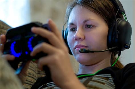 Premium Photo Gamer Girl Playing Games On Mobile Phone Addicted