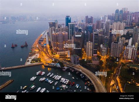 Buildings Ocean And Aerial View Of The City At Night With Lights