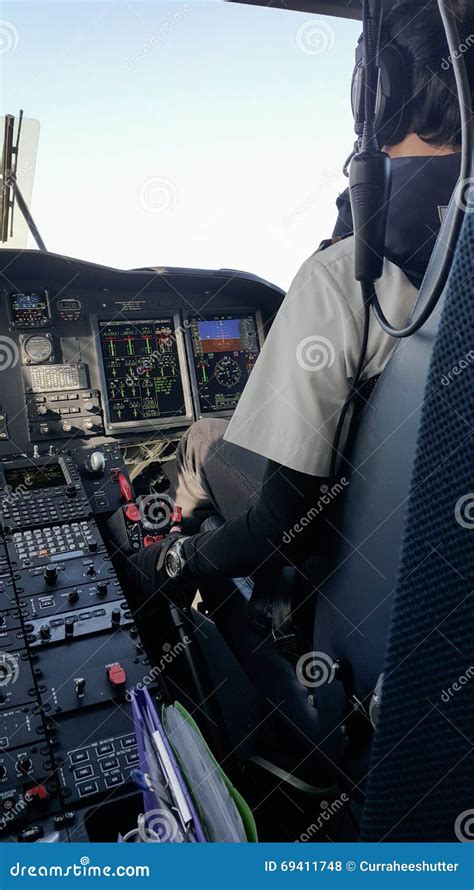 Pilot And Copilot In Corporate Plane In Cockpit Pilot Operation With Control Panel Royalty Free