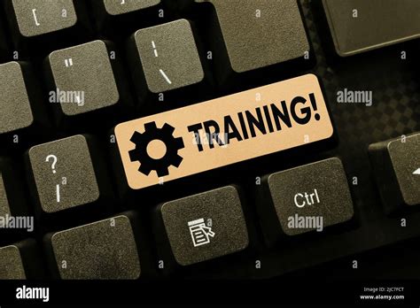 Hand Writing Sign Training Word Written On An Activity Occurred When