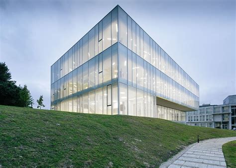 Round And Rectangular Buildings Form Adult Education Centre By 1004arquitectos Architecture
