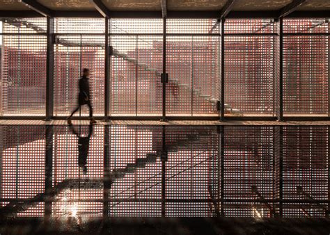 Red Mirrored Lattice Encloses Office Block By Wise Architecture