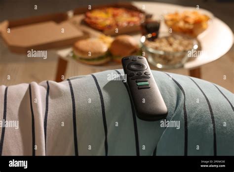 Overweight Man With Tv Remote Control On Belly At Home Closeup Stock Photo Alamy