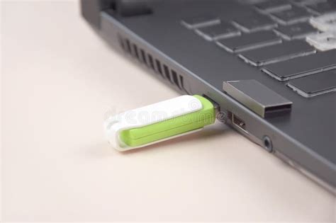 USB Memory Stick Or Flash Drive On The Keyboard Of An Open Laptop Stock Image Image Of