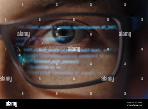 Extreme Close Up Of A Programmer Or Software Engineer Eye With Computer