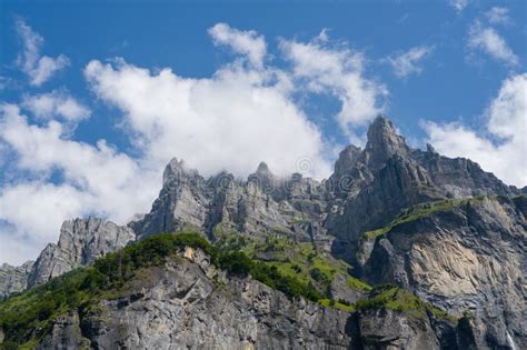 Jagged Limestone Peaks Under Blue Sky Alps Stock Image Image Of