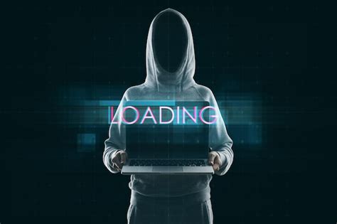 Premium Photo Hacker Holding Computer With Abstract Creative Digital Text Hologram On Dark