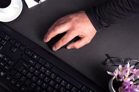 Premium Photo Man At Work Closeup Top View Of Man Working On Laptop