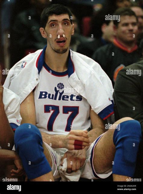 Washington Bullets Gheorghe Muresan Sits On The Bench After Being Hit