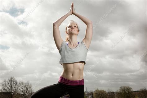 Woman In Tree Pose Stock Image F Science Photo Library