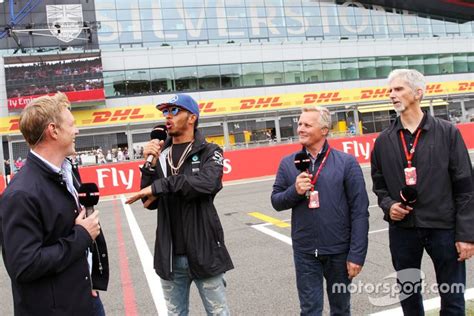 L To R Simon Lazenby Sky Sports F1 Tv Presenter Lewis Hamilton