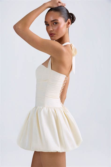 Ludmila Halterneck Lace Up Bubble Hem Corset Micro Mini Dress In Ivory