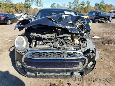 Report WMWXP7C5XG3B49549 MINI COOPER 2016 BLACK GAS Price And Damage History