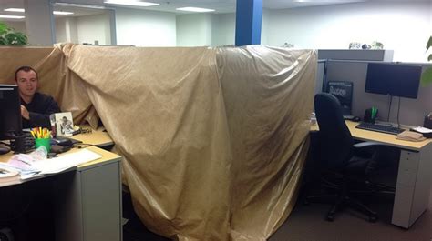 Ha The Woman S Cubicle Has A Large Cover Over It Backgrounds  Free