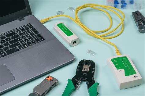 Premium Photo Check Whether The Ethernet Cable Is Connected Correctly To The Laptop