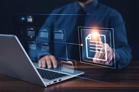 Premium Photo Businessman Using Computer For Dms Documents Management And Erp Software For