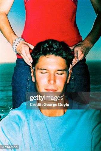 Closeup Of A Man Getting His Head Massaged By A Woman High Res Stock