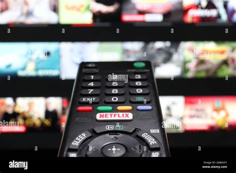 Watching Netflix On A Smart Television Using The Netflix Button On A TV Remote Control Stock