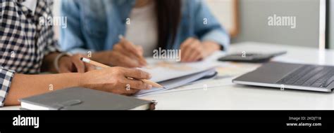 Construction Business Plan Concept Two Architects Discuss About Project And Blueprint Of