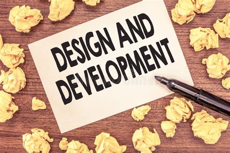 Conceptual Hand Writing Showing Design And Development Business Photo Showcasing Defining The