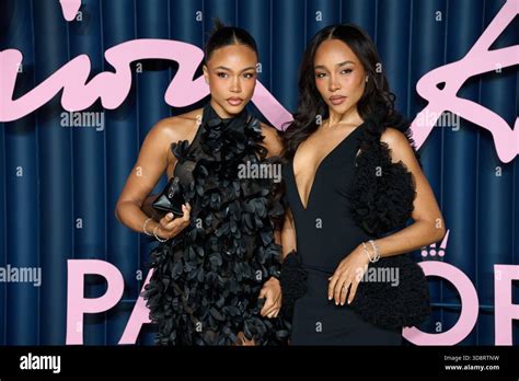 Loz Vassallo Left And Gigi Vassallo Pose For Photographers Upon