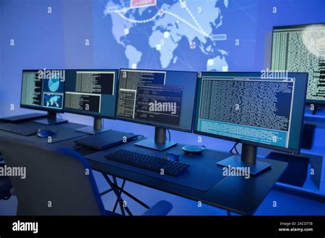 Cyber Security Command Center With Multiple Monitors Displaying Data