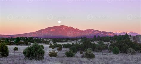 Full Moon Rises Over Humphreys Peak Near Grand Canyon In Arizona In The