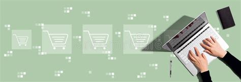 online shopping theme with person using laptop computer stock