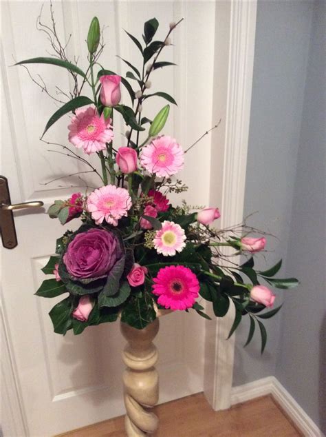 Asymmetrical Floral Arrangement With Brassica Roses Lilies And Gerbera