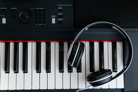 Headphones On Musical Synthesizer Keyboard Headphones On Electronic Piano Stock Image Image