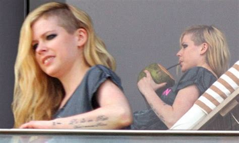 Avril Lavigne Lands In Rio For A Concert AND Some Coconut Juice At The Same Luxury Hotel Where