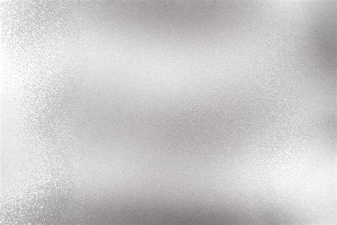 Glowing Silver Metallic Wall With Scratched Surface Abstract Texture Background Stock