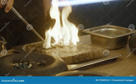 The Chef Cooks Meal In Flambe Style In Modern Gastro Cafe Stock Image Image Of Tasty Alcohol