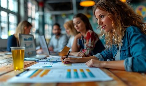 Premium Photo A Woman Sits At A Table With A Graph That Says Graph On It