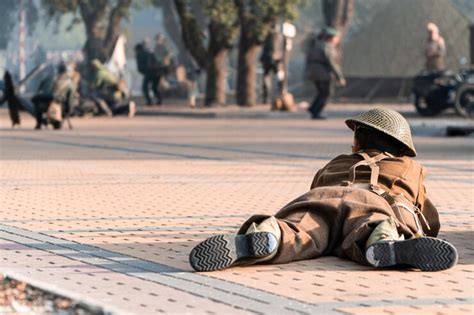 Premium Photo Second World War Soldier Lying On The Ground During
