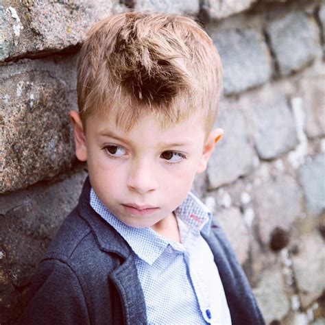 Premium Photo Close Up Of Cute Boy Looking Away