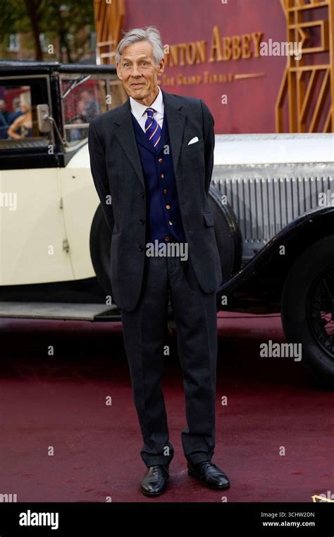 Douglas Reith Poses For Photographers Upon Arrival At The World Premiere Of The Film Downton
