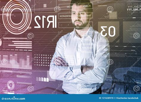 Worried Programmer Standing With His Arms Crossed And Looking At The