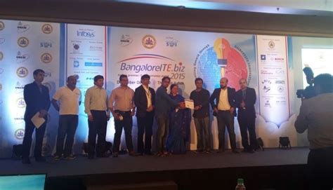 Receiving Prize From Principal It Bt Secretary At Mobile10x Bangalore Appathon Helpfast