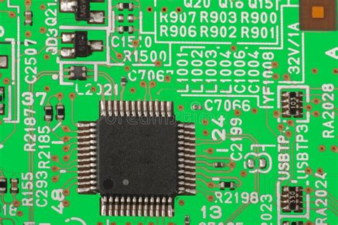 Electronic Circuit Board Close Up Microchips And Other Components
