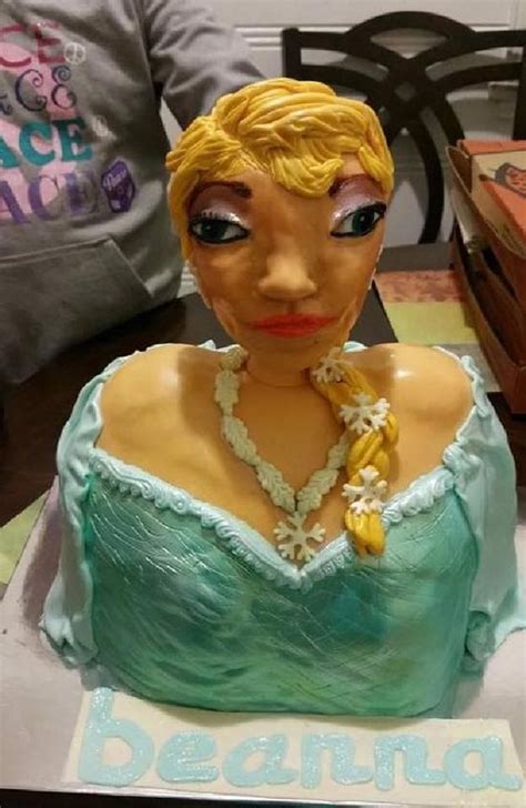 A Cake With A Woman S Face On It