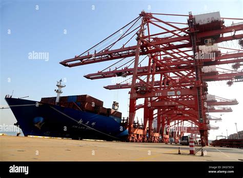 Aerial Photos Show Cargo Ships Loading And Unloading Containers At The Container Terminal Of