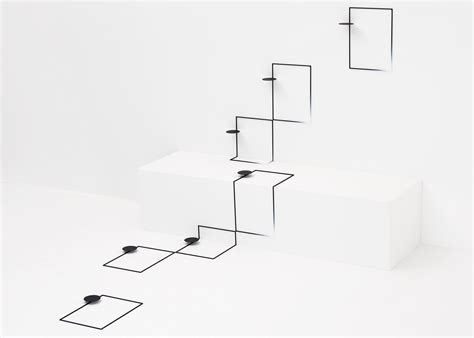 Nendos Border Tables Fit The Contours Of A Tokyo Gallery