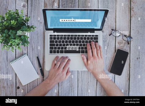 User Typing Password On Computer Security Code To Access Secured