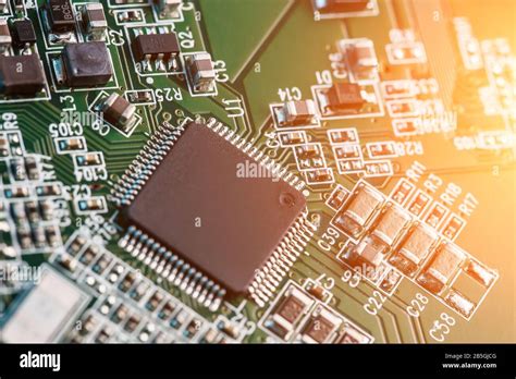 Electronic Circuit Board Close Up Processor Chips And Capacitors Inside Computers Stock Photo
